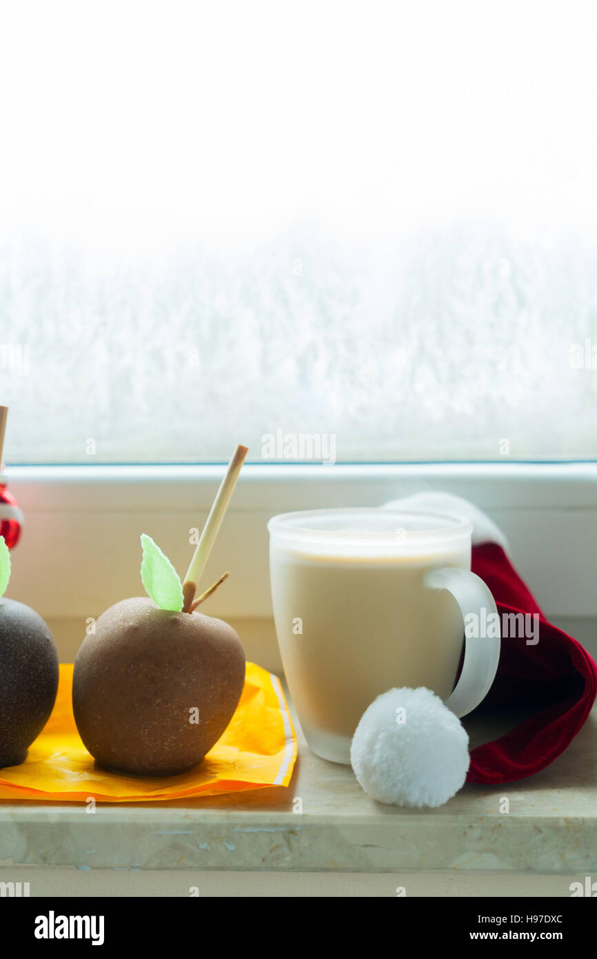 Cup of coffee on window sill Stock Photo - Alamy