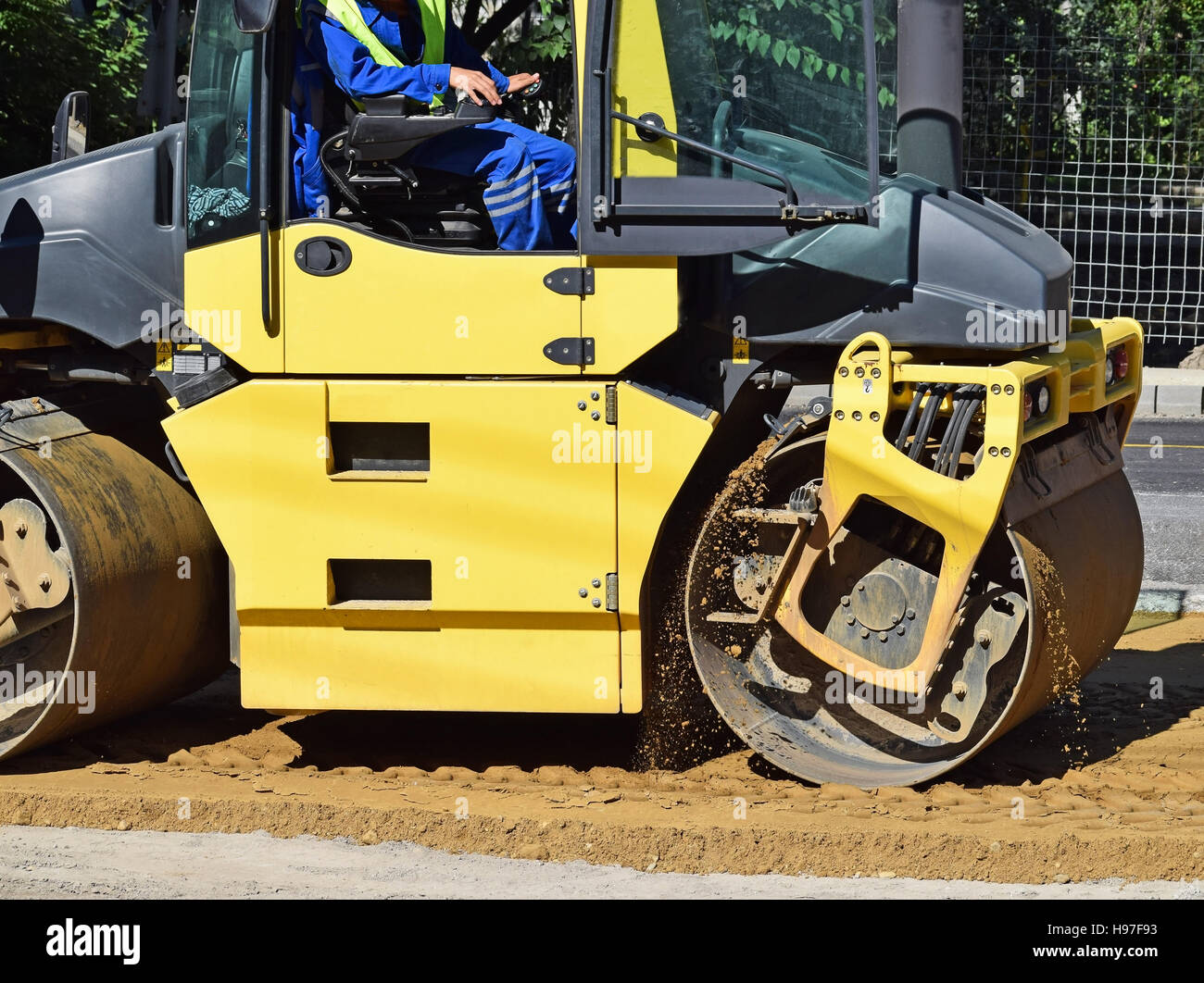 Road roller at the road construction in the city Stock Photo - Alamy
