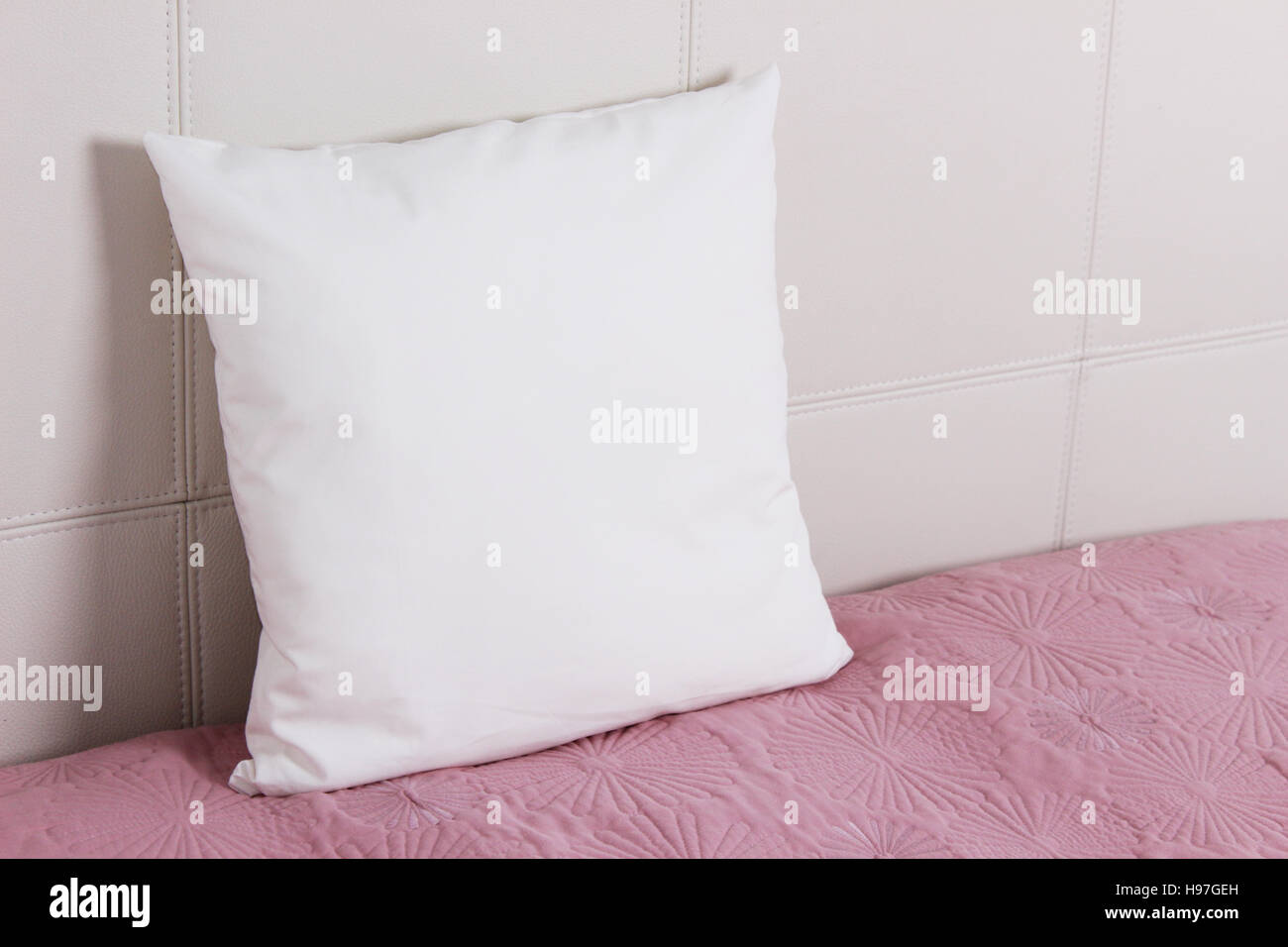 Pillow case Mockup. White pillow on bed in the bedroom. Perspective ...