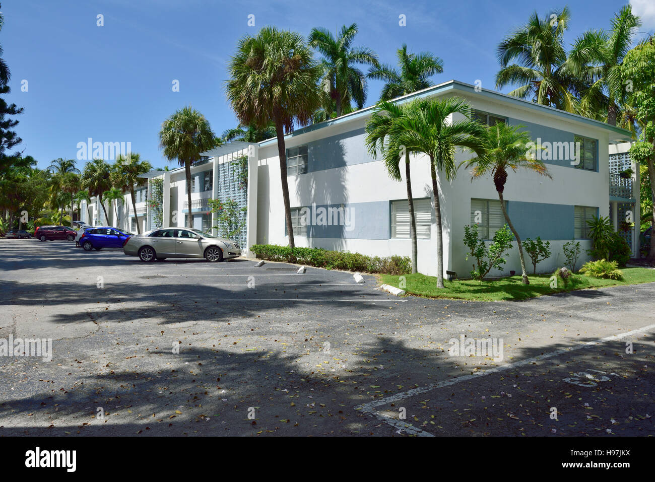 Modern low rise residential apartments Naples, Florida, USA with palm ...