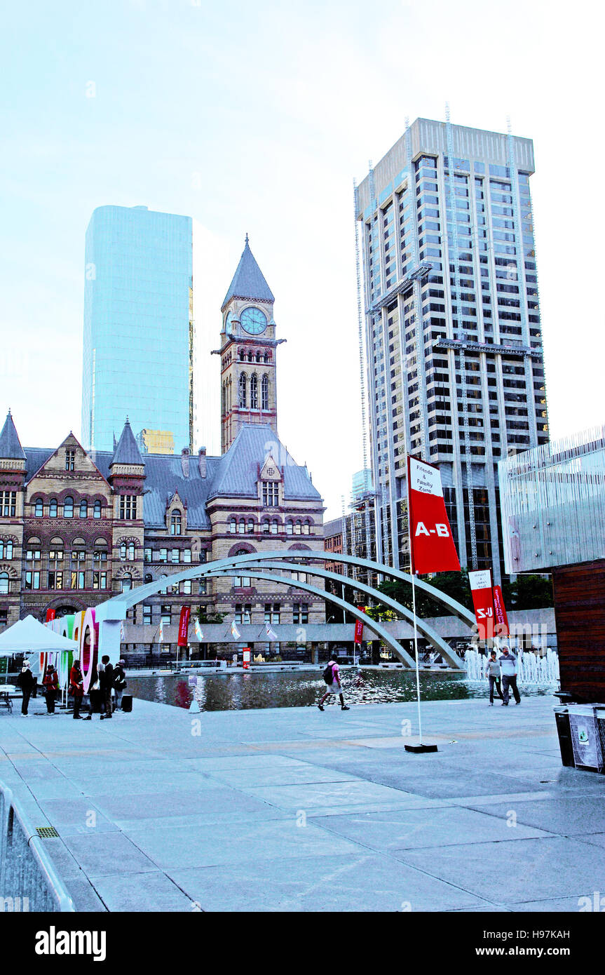 The Nathan Phillip square in Toronto with the clock tower of the old ...
