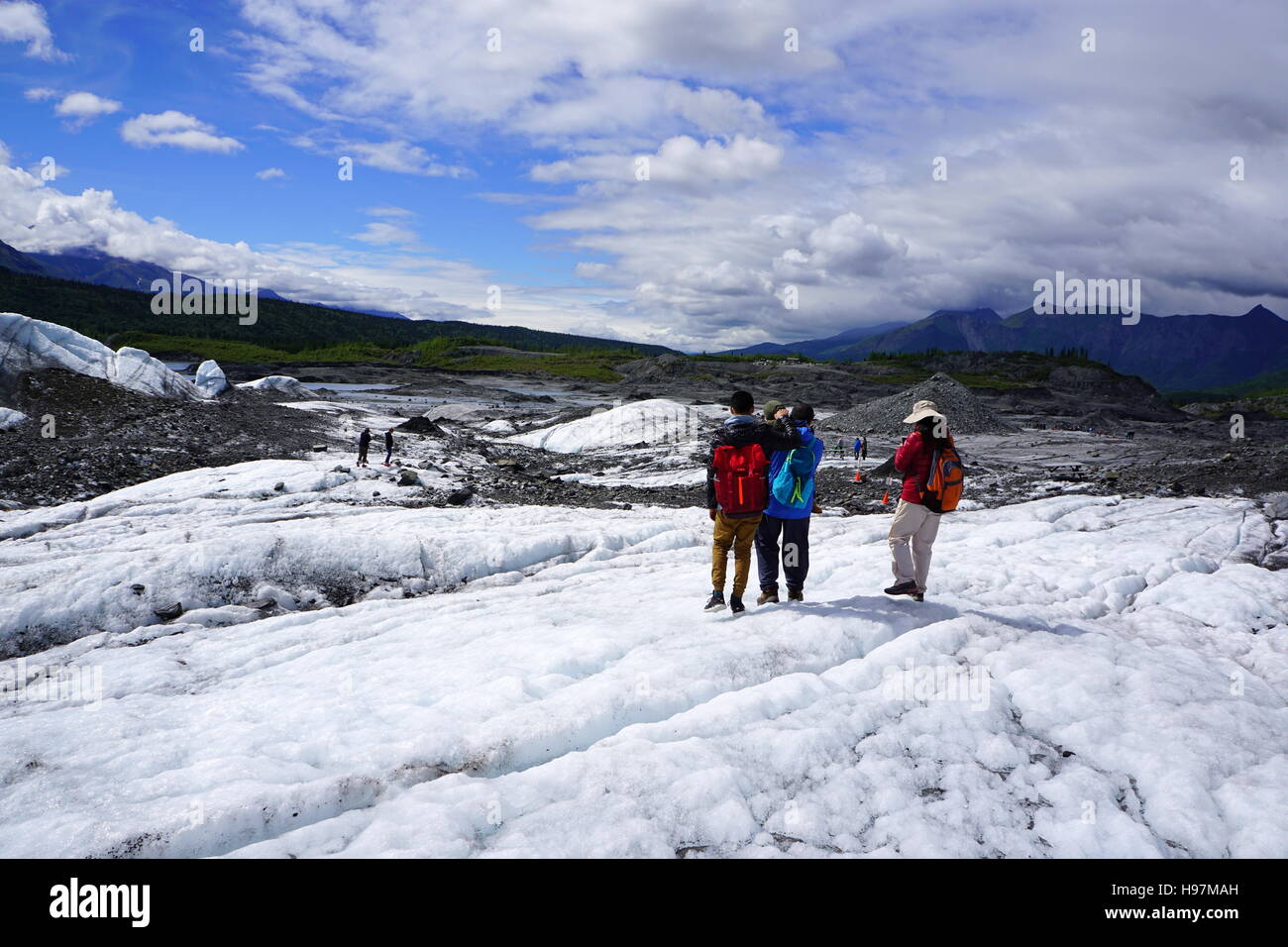 A group of tourist walking on ice at the Glacier View in Matanuska ...