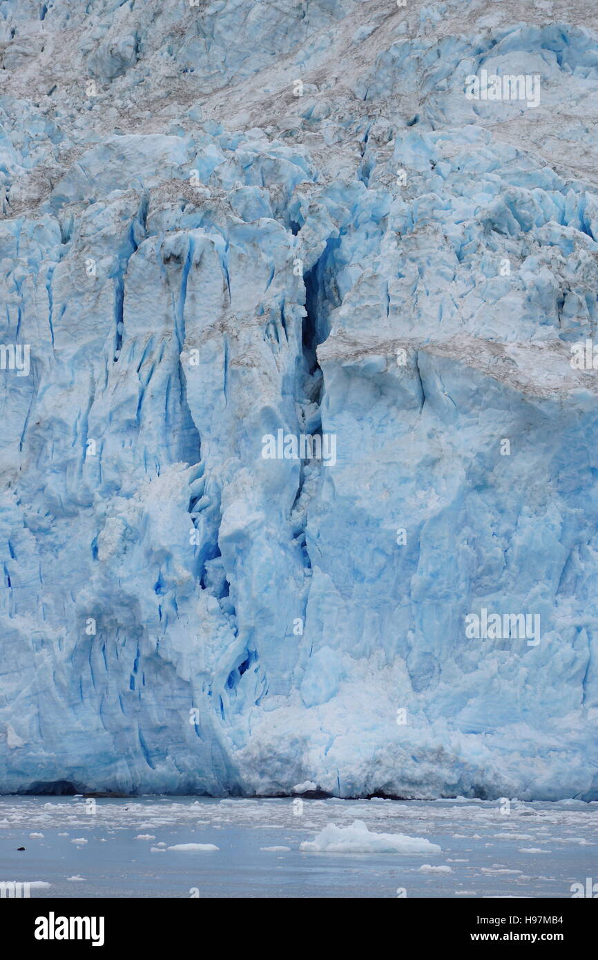 Cracked blue ice of the melting Alaskan glacier, Kenai Fjords National ...