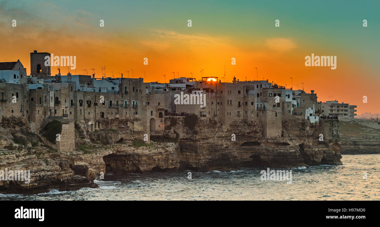 sunset on seaside village in Apulia, Italy Stock Photo - Alamy