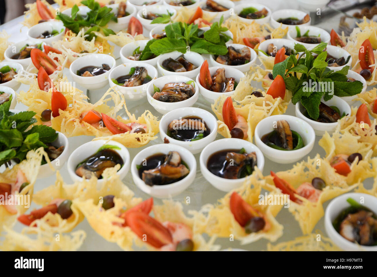 Catering service plate .appetizing sandwiches on plastic sticks ...