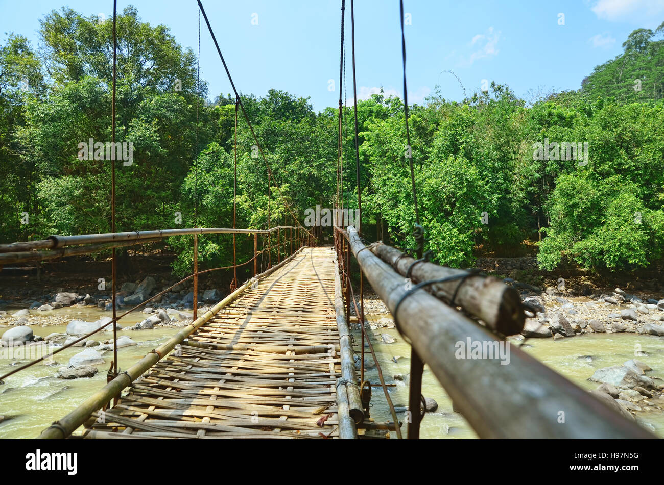 Rusty iron and wooden handrail of an old suspension bridge Stock Photo ...