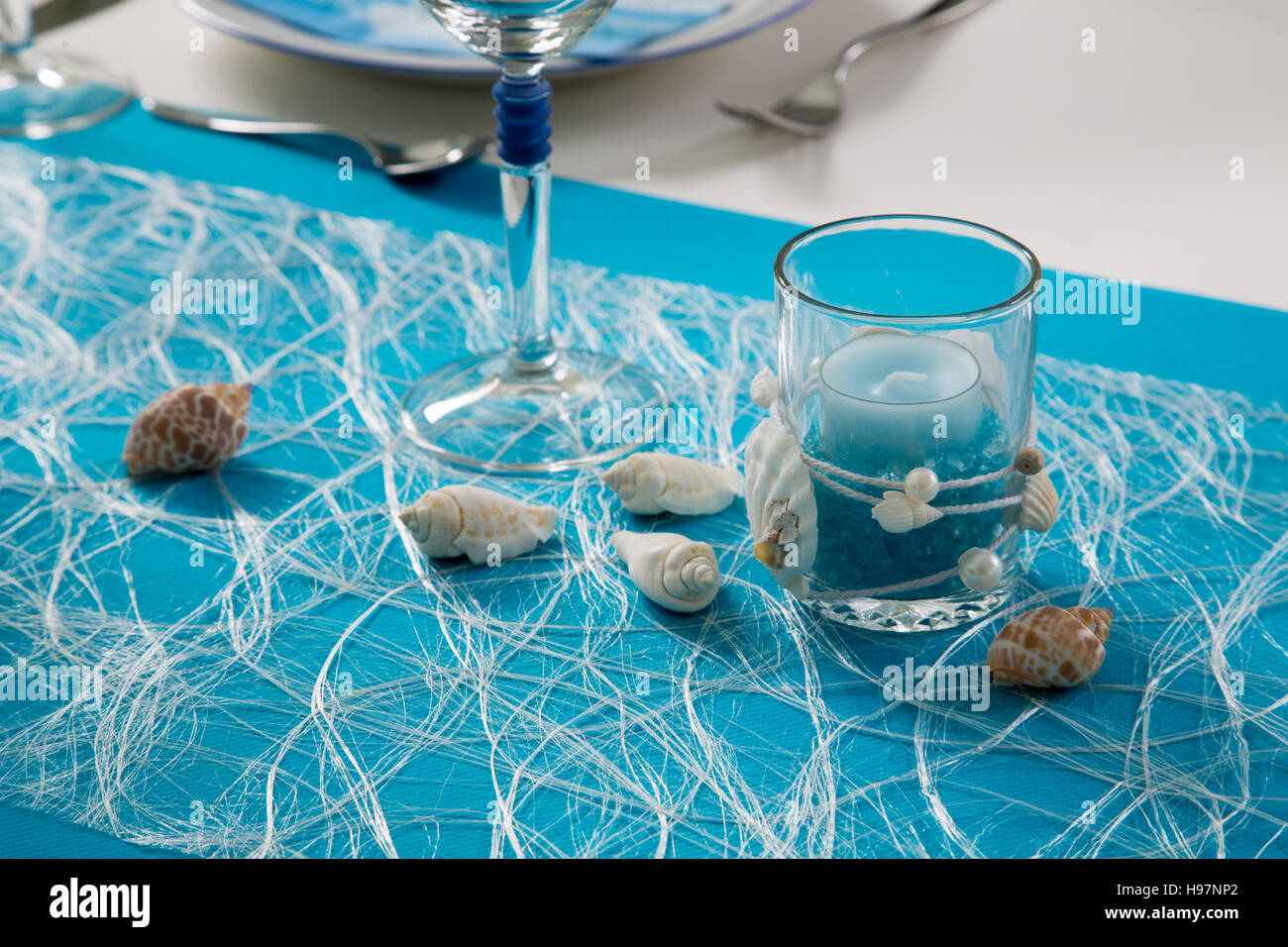 Blue table arrangement for an event party Stock Photo - Alamy