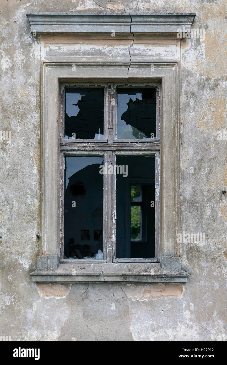 Old window in ruined wall of an old manor house Stock Photo - Alamy