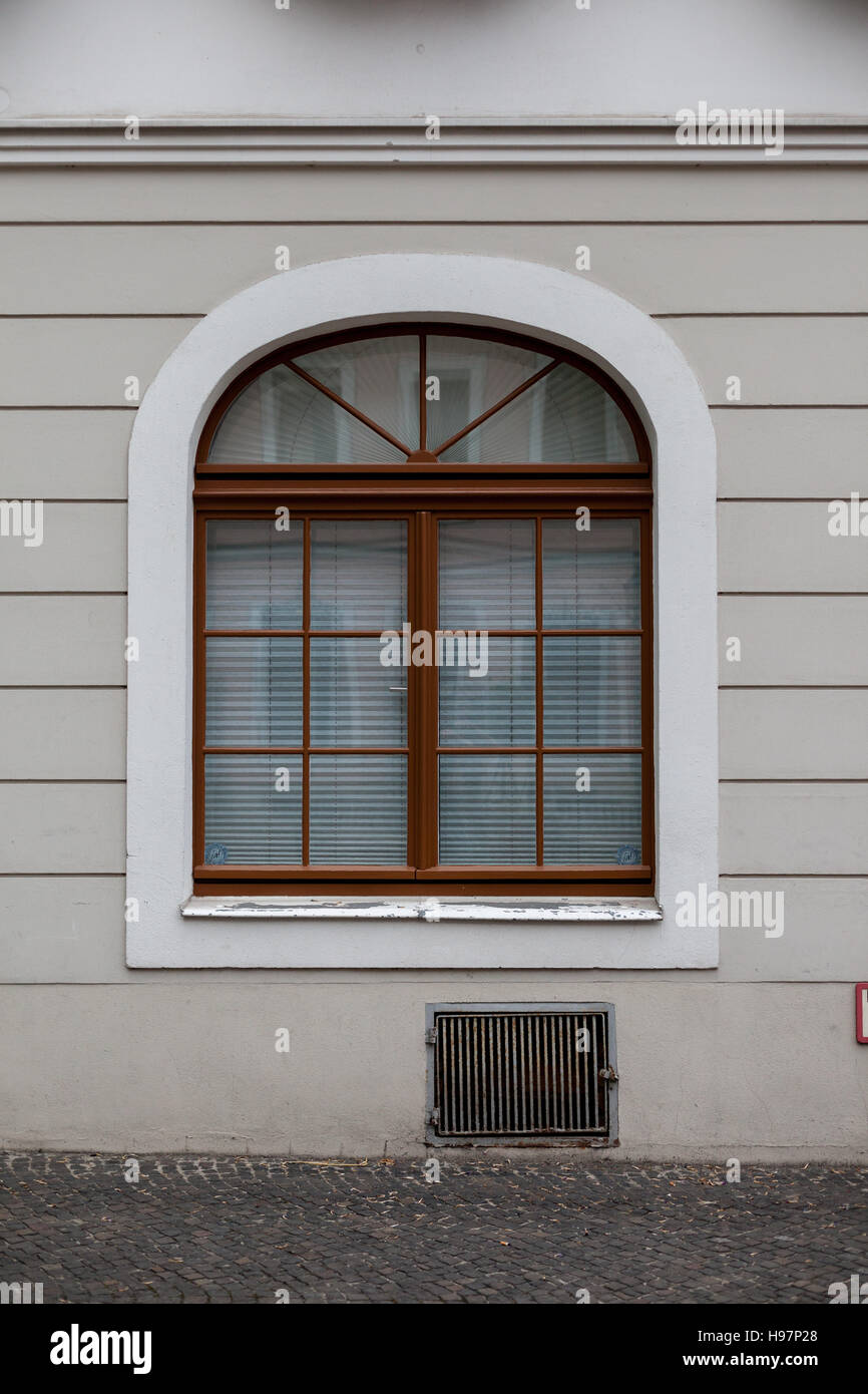 Large wooden, arched window in the building Stock Photo - Alamy
