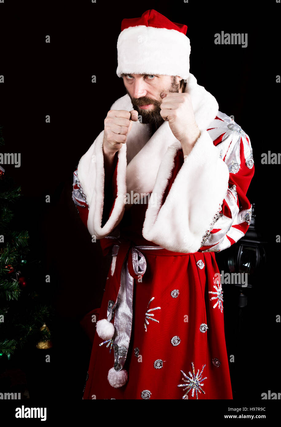bad brutal Santa Claus clenched his fists, ready to fight on the ...