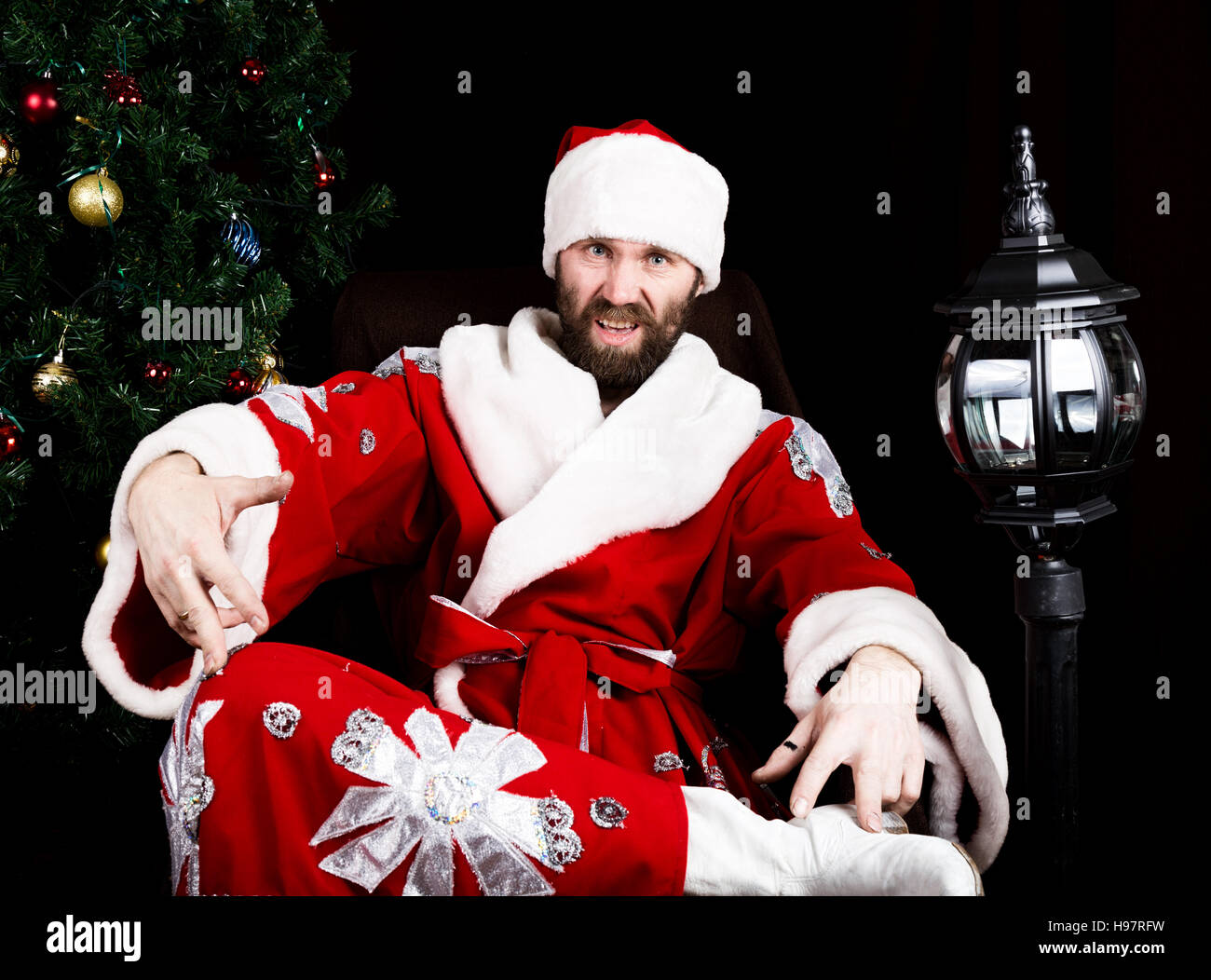 bad rastoman Santa Claus doing different finger signs on the background ...