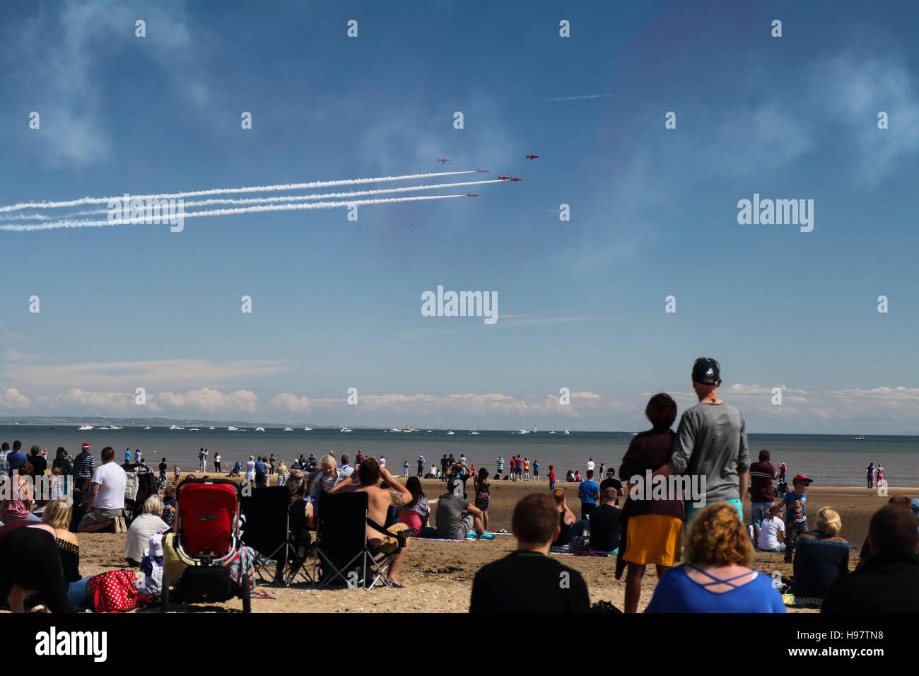 Red Arrows display over beach Stock Photo - Alamy