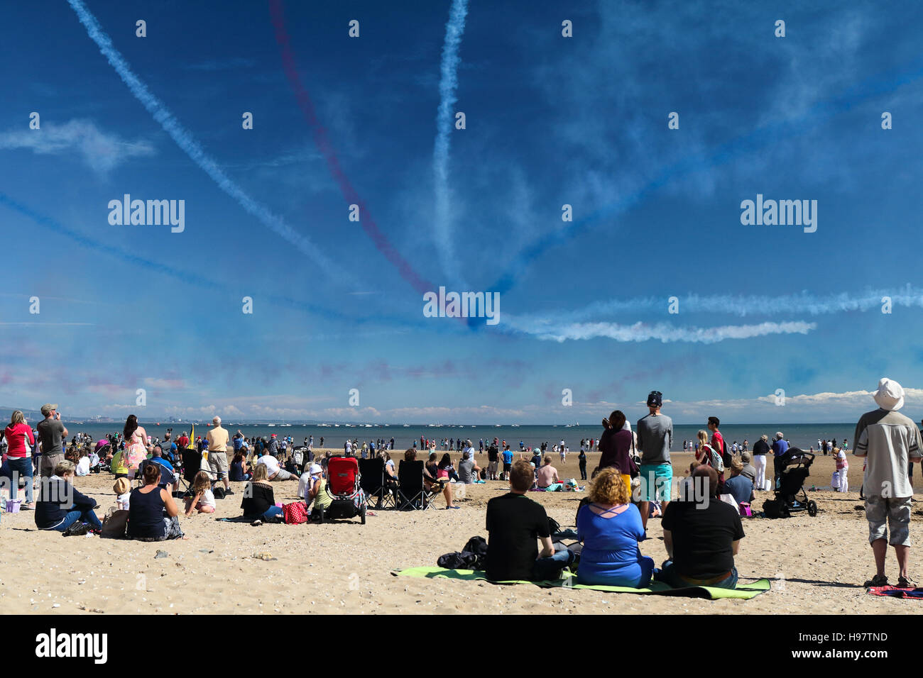 Red Arrows display over beach Stock Photo - Alamy