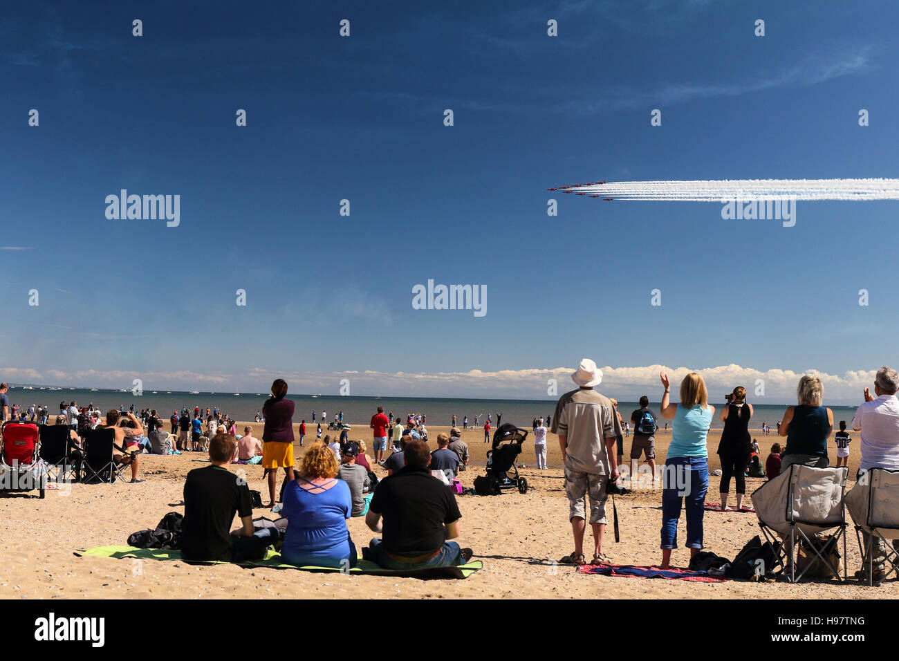 Red Arrows display over beach Stock Photo - Alamy