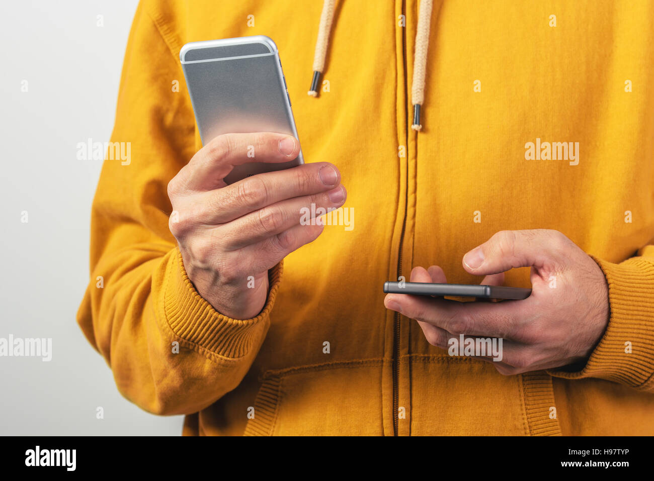Using two hands hi-res stock photography and images - Alamy