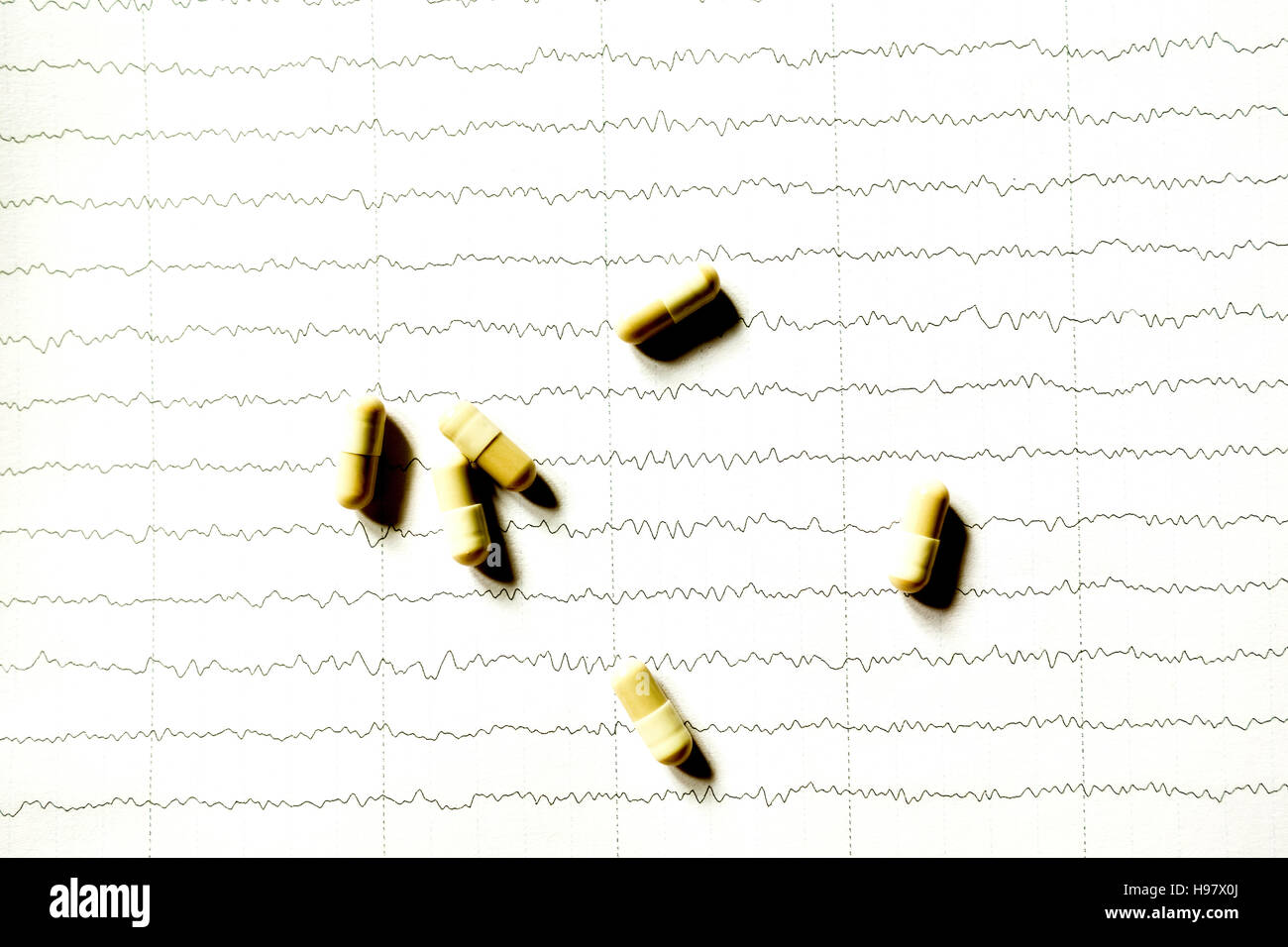Pill on a cardiogram trace Stock Photo - Alamy