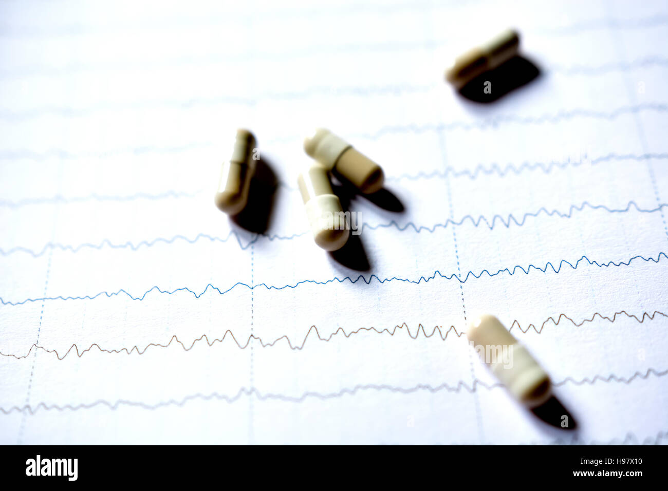 Pill on a cardiogram trace Stock Photo - Alamy