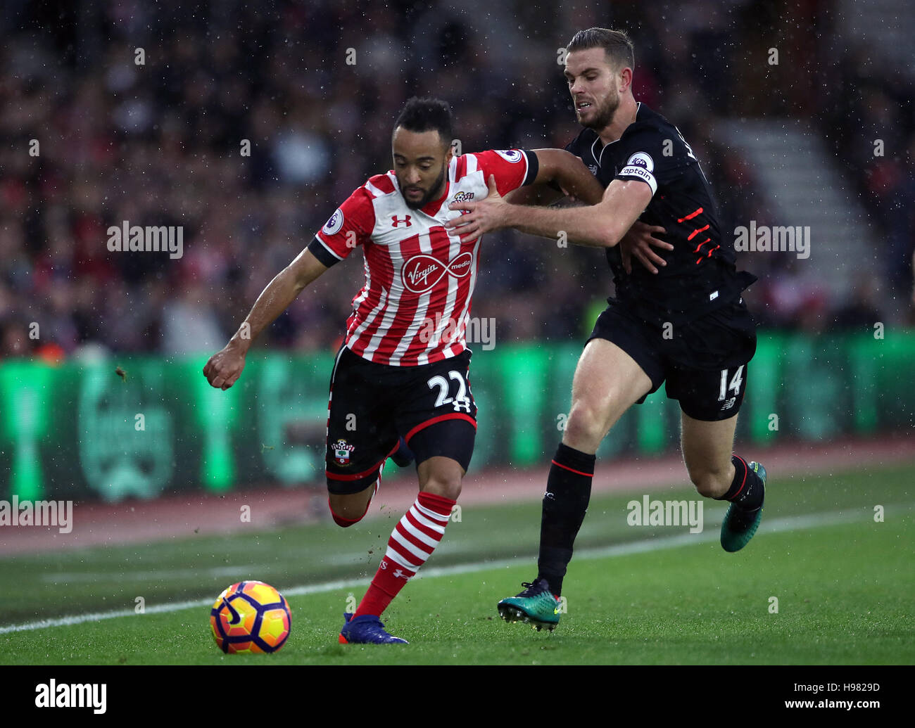 Southampton's Nathan Redmond (left) and Liverpool's Jordan Henderson ...