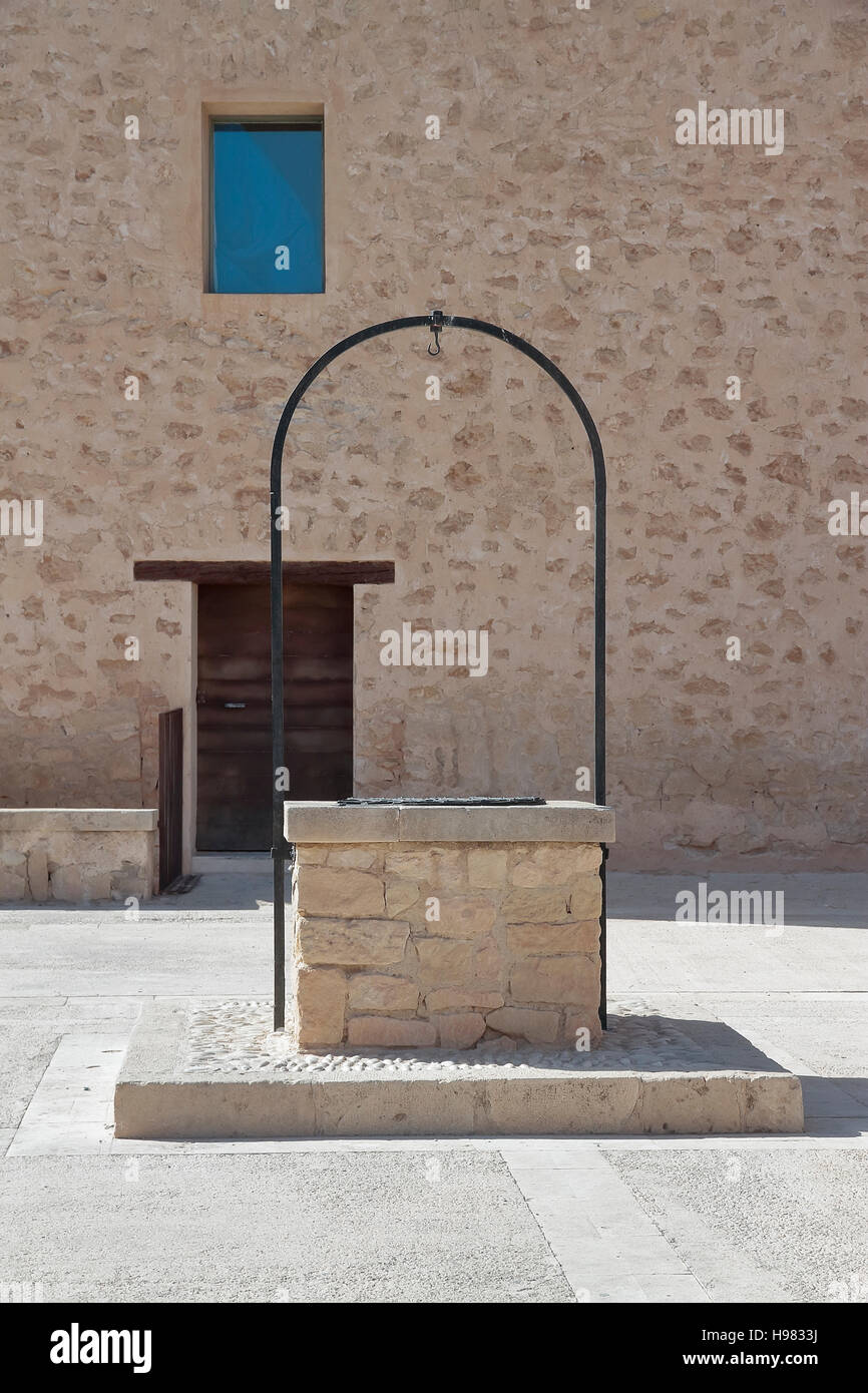 ancient stone well in the castle of santa barbara, alicante, spain ...