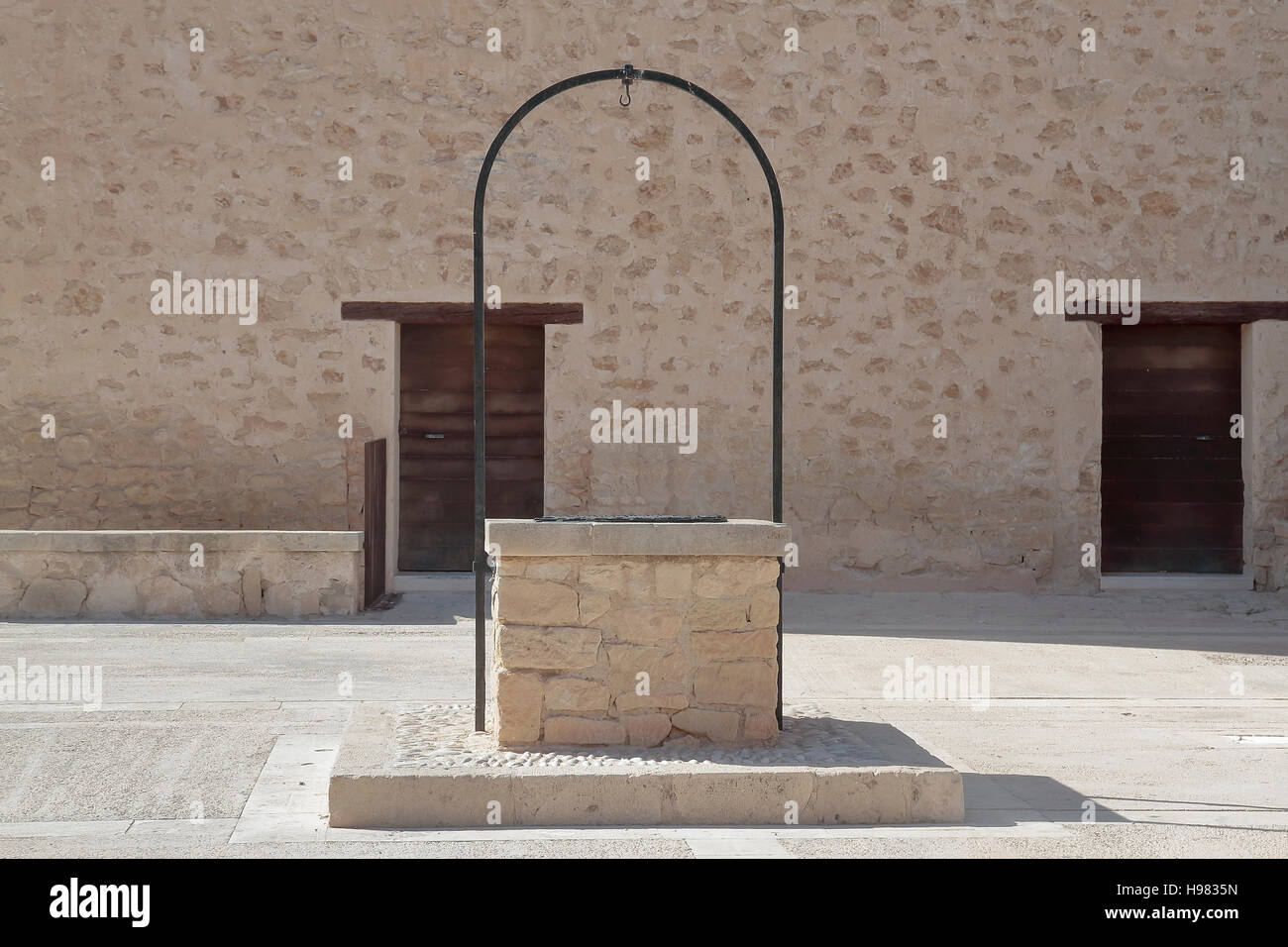 ancient stone well in the castle of santa barbara, alicante, spain ...