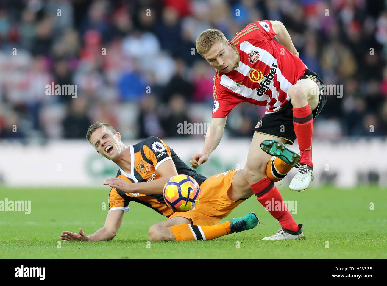 Sunderland's Duncan Watmore (right) and Hull City's Michael Dawson ...