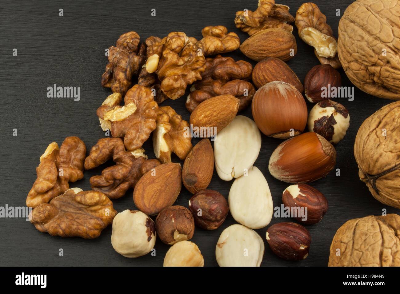 Super foods for human brain. Nuts on a wooden table. Walnuts Stock ...