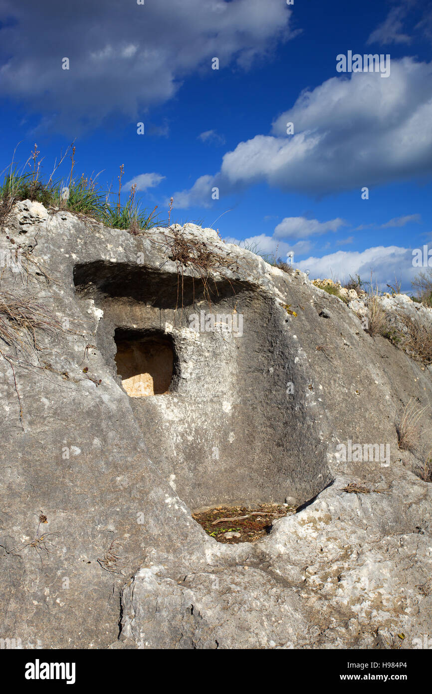 Monumental prehistoric tomb with high relief details. Age middle bronze ...