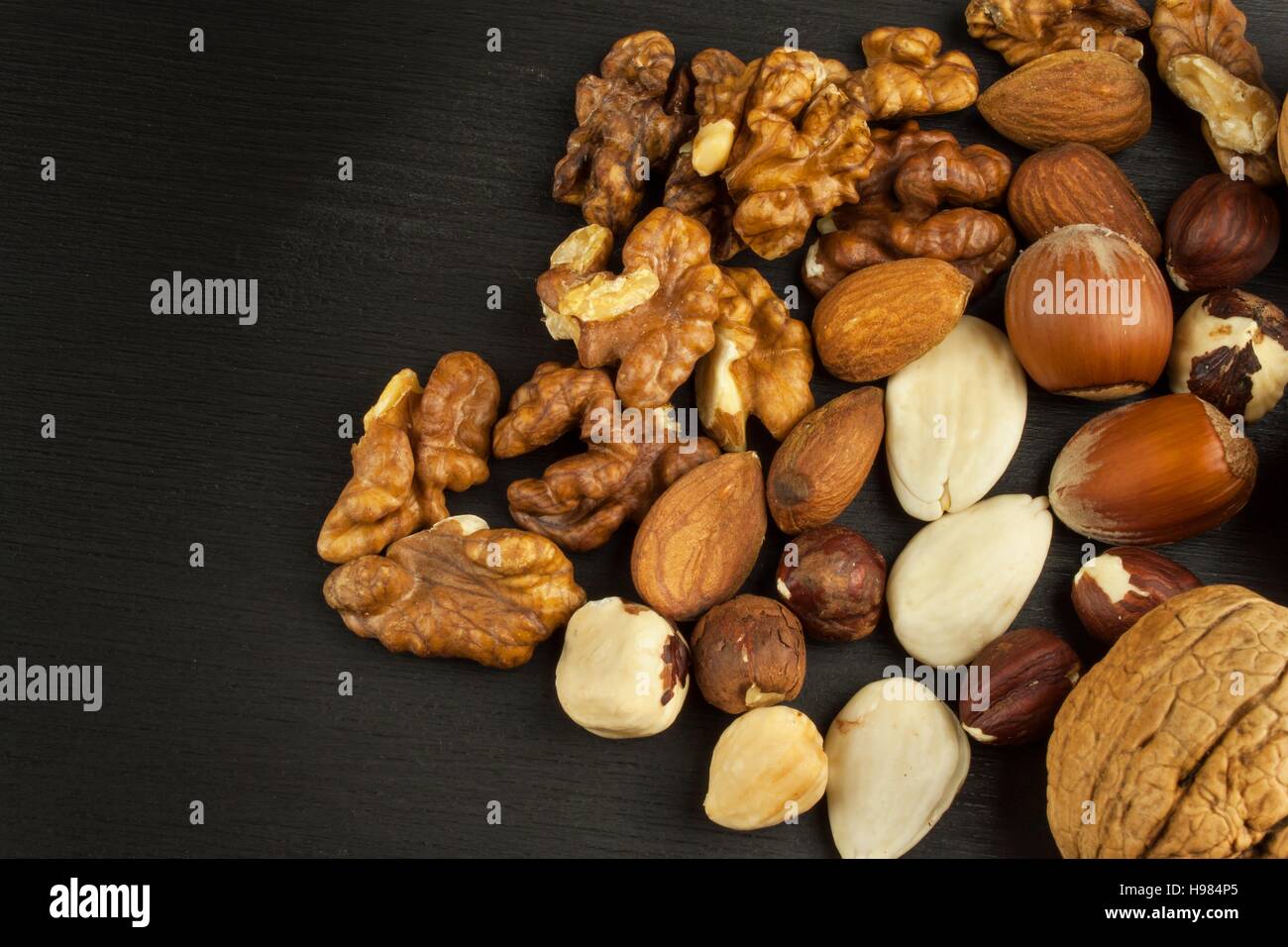 Super foods for human brain. Nuts on a wooden table. Walnuts Stock ...