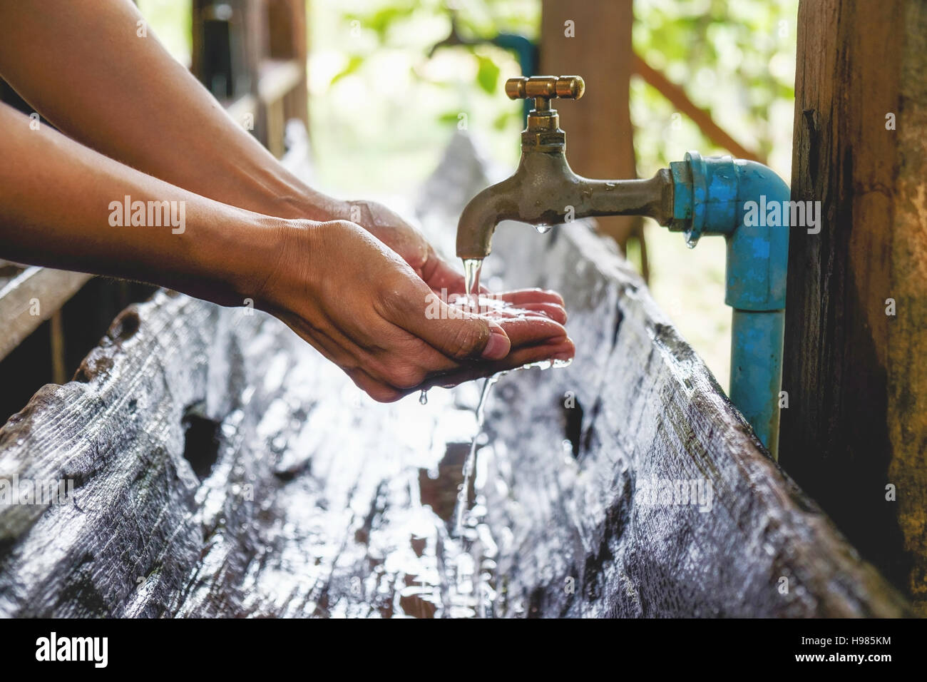 Washing hands under flowing tap water Stock Photo - Alamy