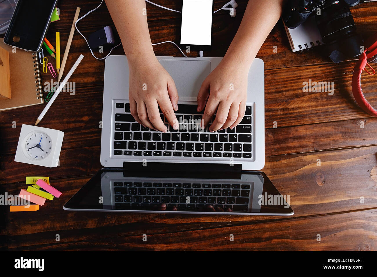 Businessman hand working with new modern computer and business charts ...