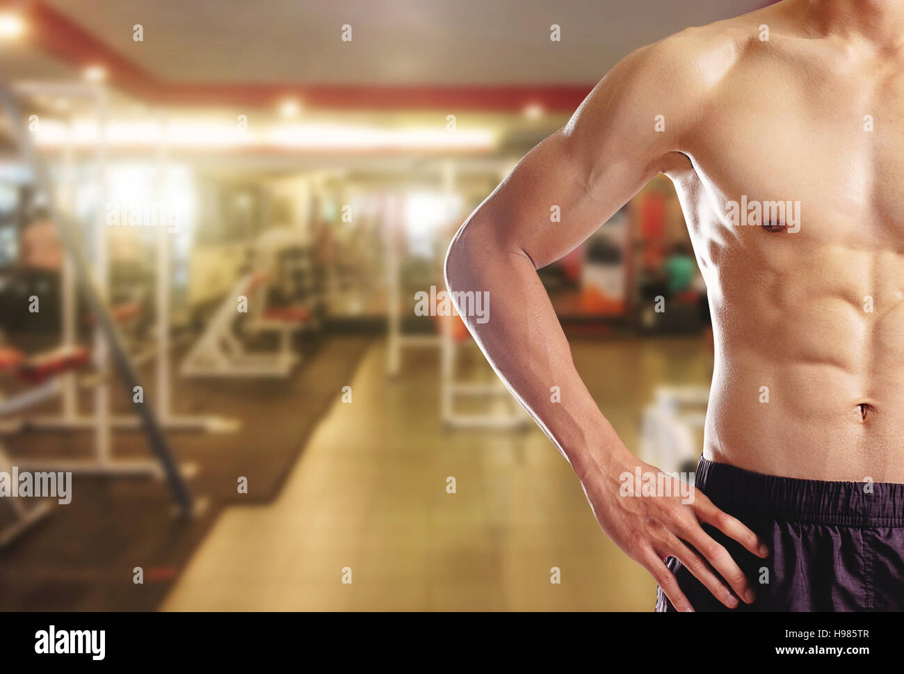 Young muscular man showing abs hi-res stock photography and images - Alamy