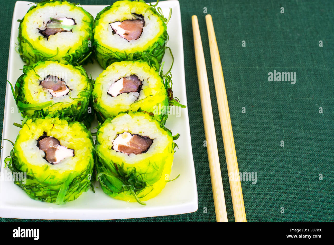Sushi Roll with Chukoy, Salmon and Cheese. Studio Photo Stock Photo - Alamy