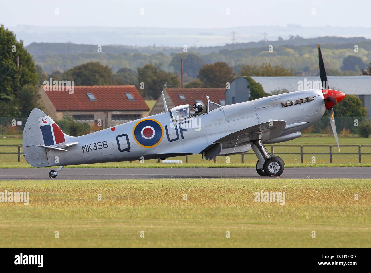 Supermarine Spitfire LF.IXc taxiing at Kemble Airfield Stock Photo - Alamy