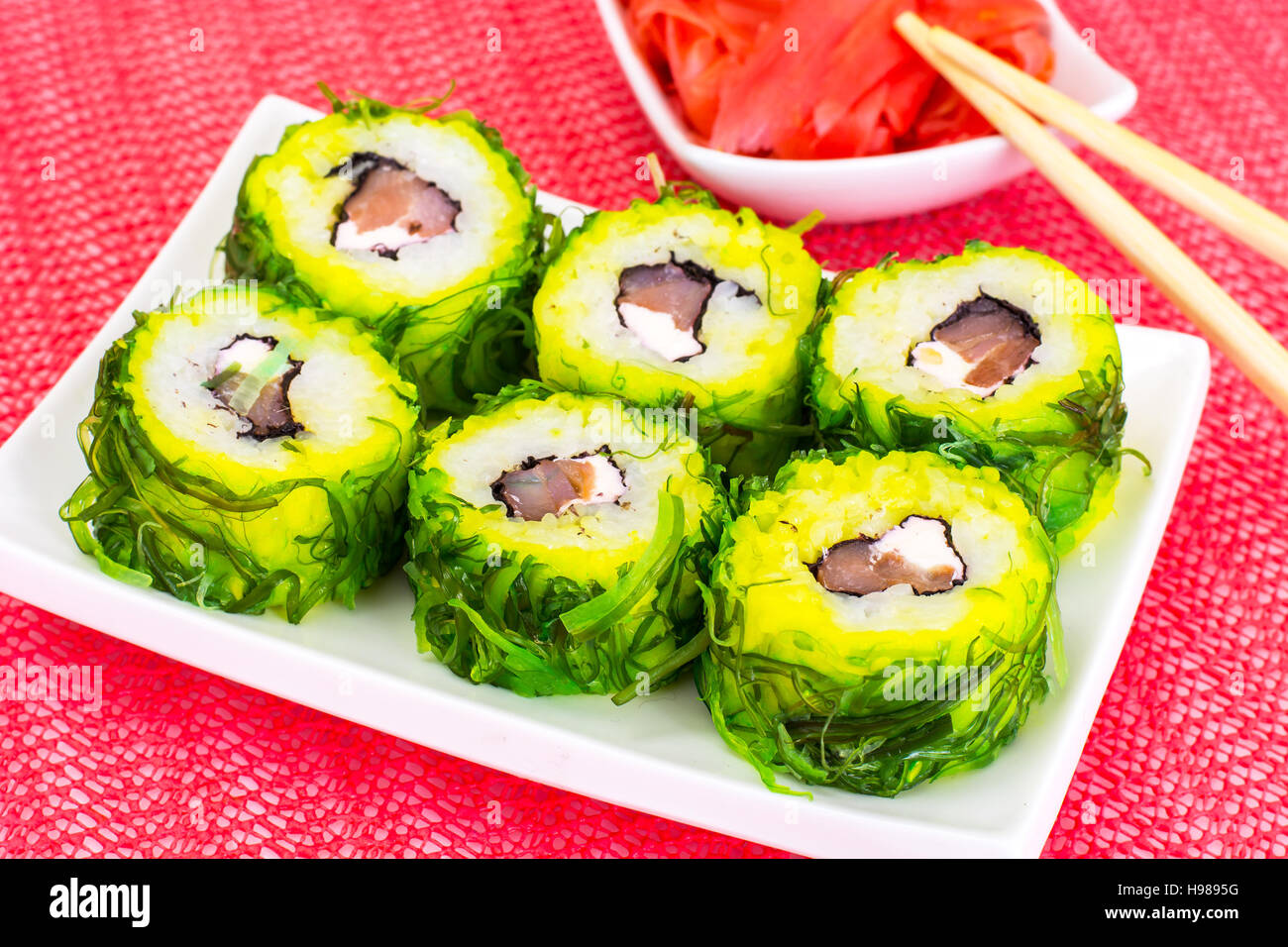 Sushi Roll with Chukoy, Salmon and Cheese. Studio Photo Stock Photo - Alamy