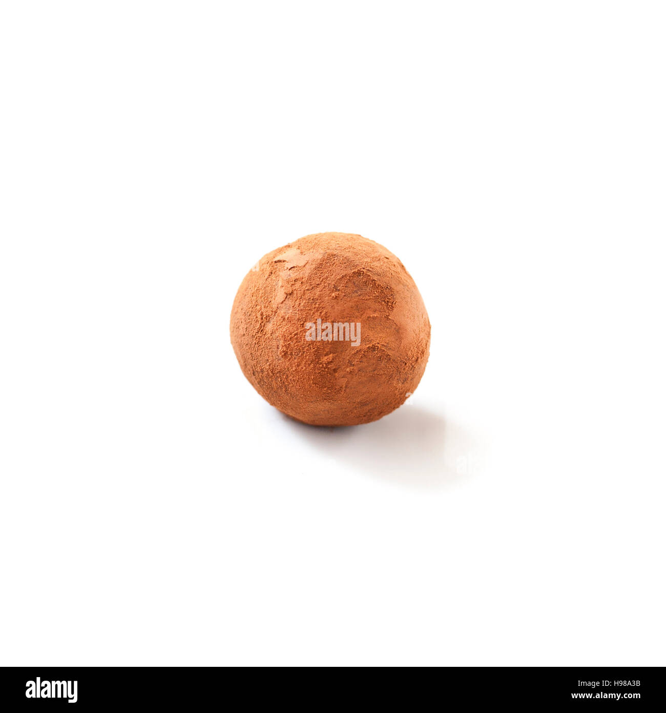 Single Chocolate Truffle dusted in cocoa powder, on White Background ...