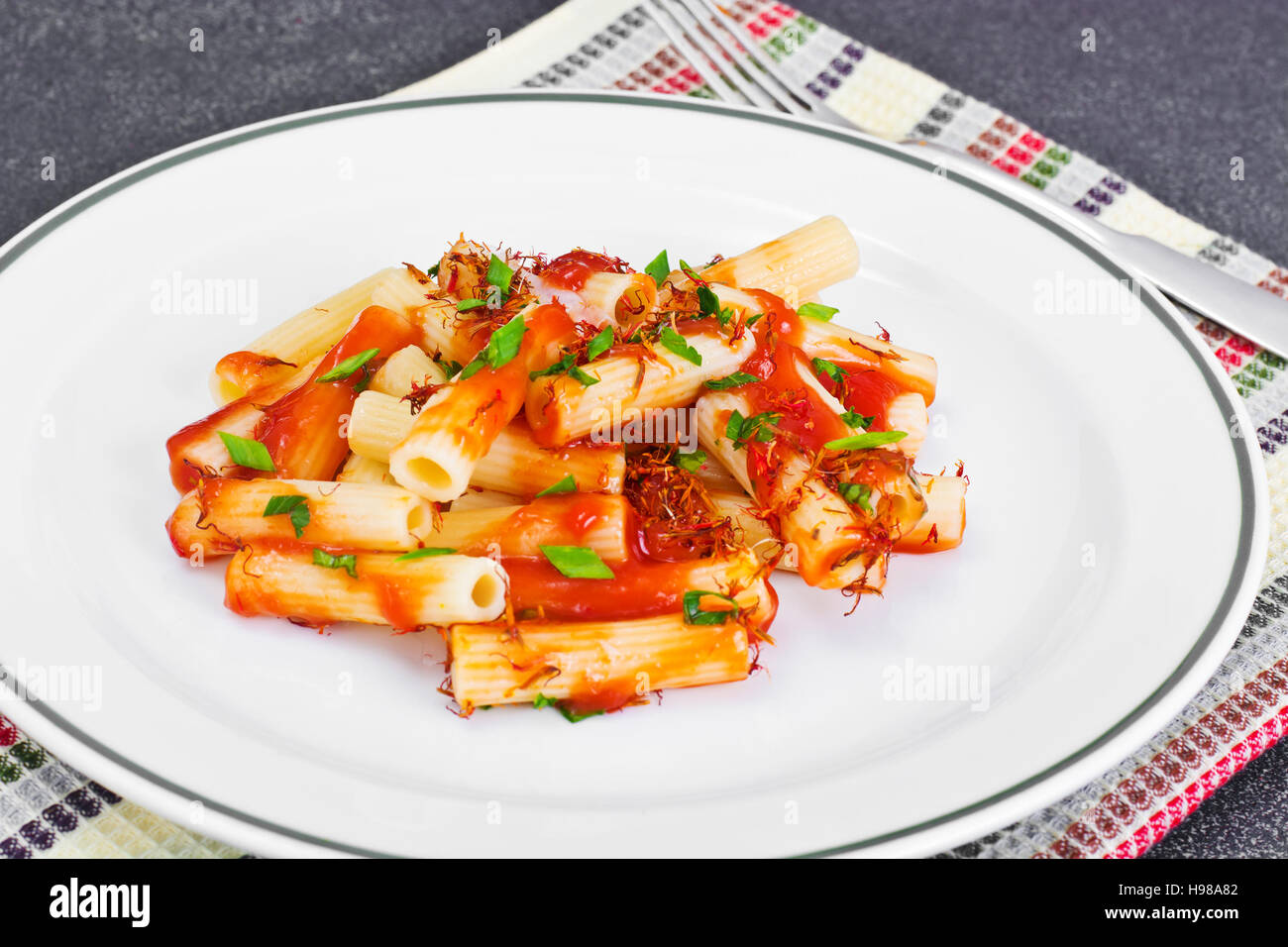 Pasta with Tomato Sauce Ketchup and Saffron Studio Photo Stock Photo ...