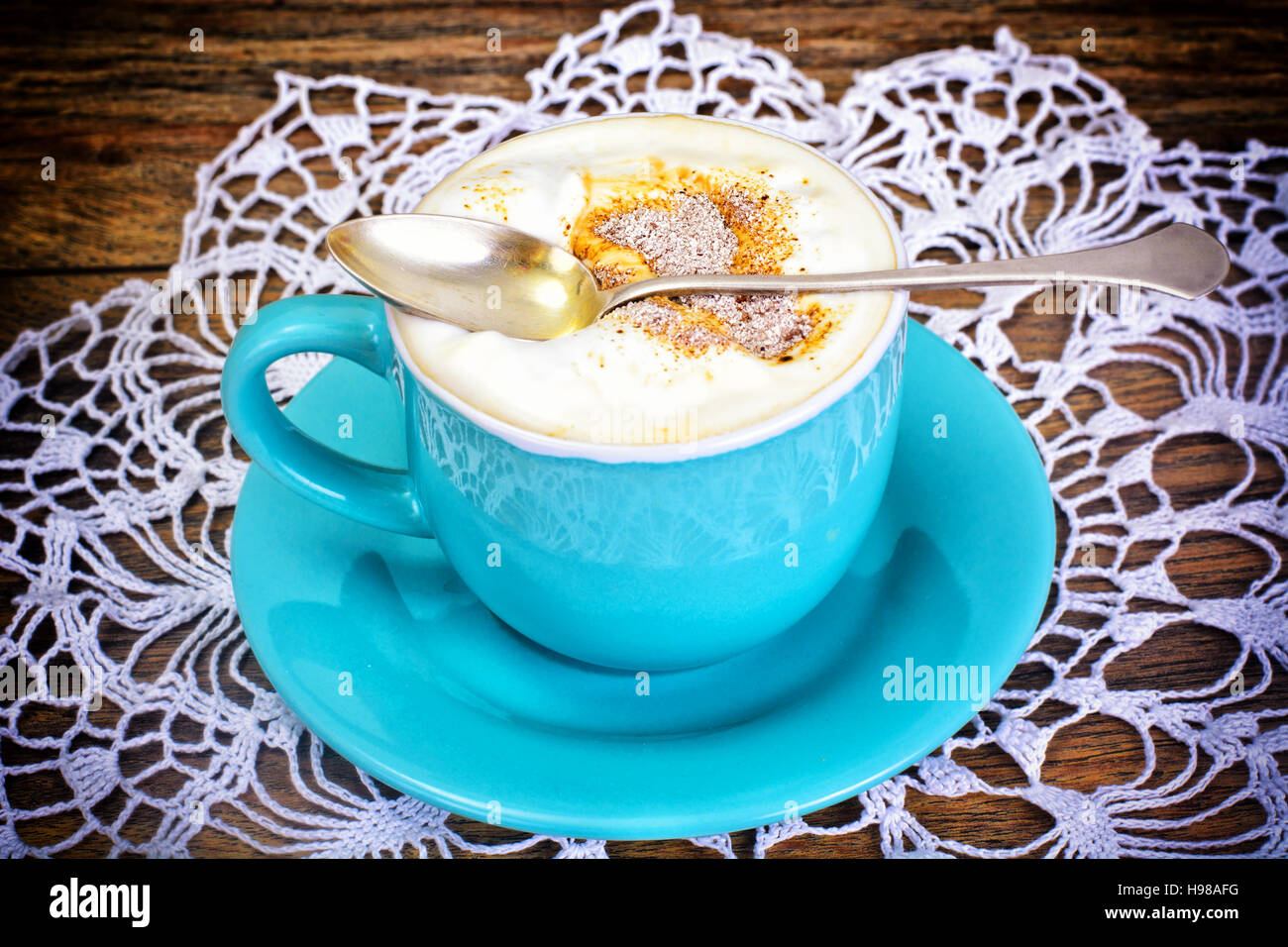 Coffee with milk, cappuccino in a blue retro cup. Studio Photo Stock ...