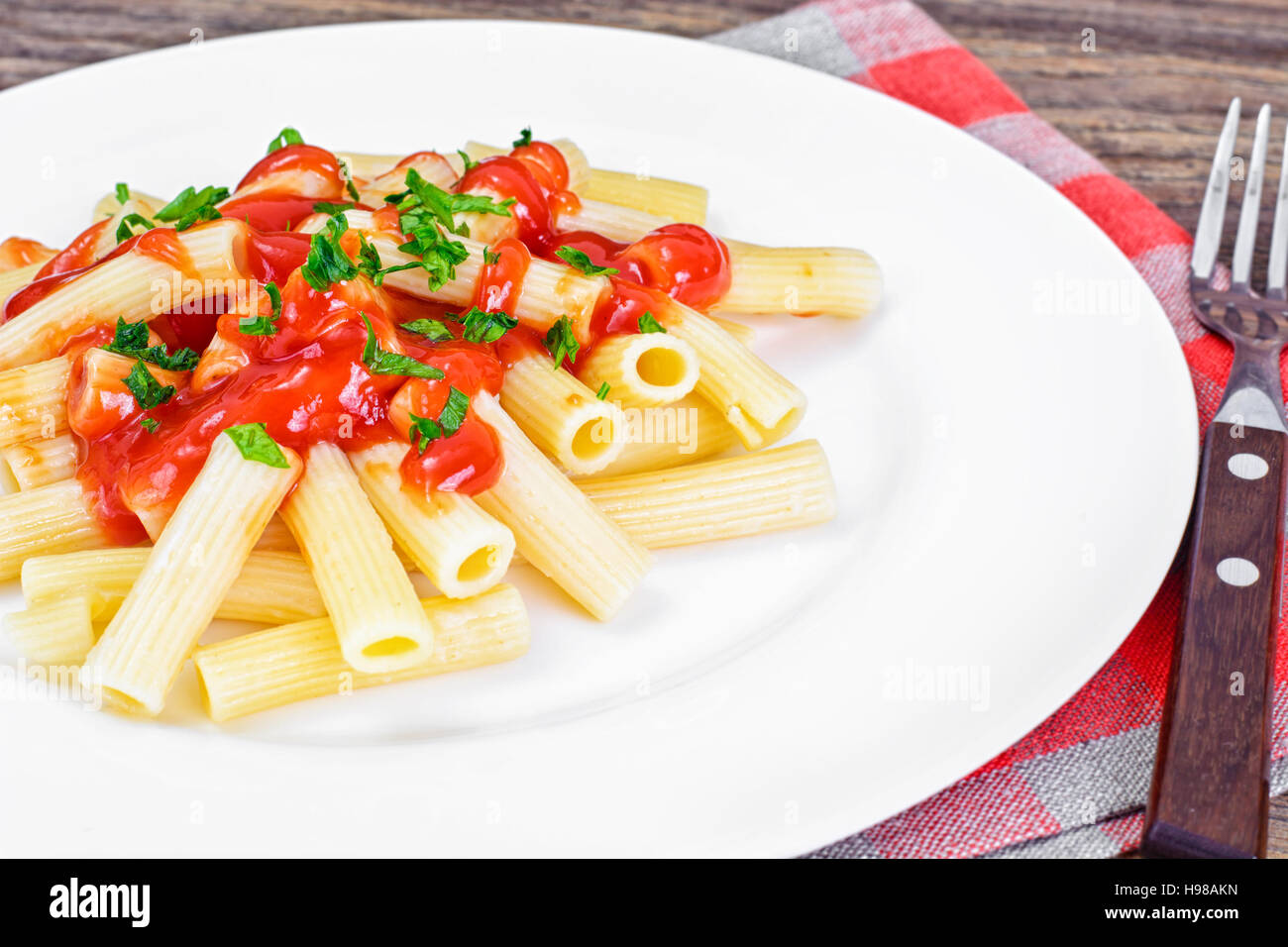 Pasta with Tomato Ketchup Sauce, Green Onions and Cheese Studio Photo ...