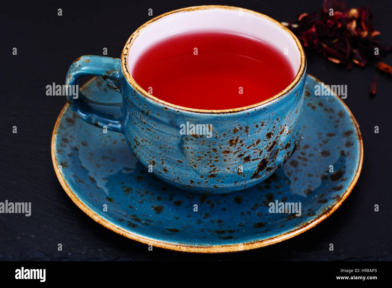 Red Tea in Beautiful Cup. Studio Photo Stock Photo - Alamy