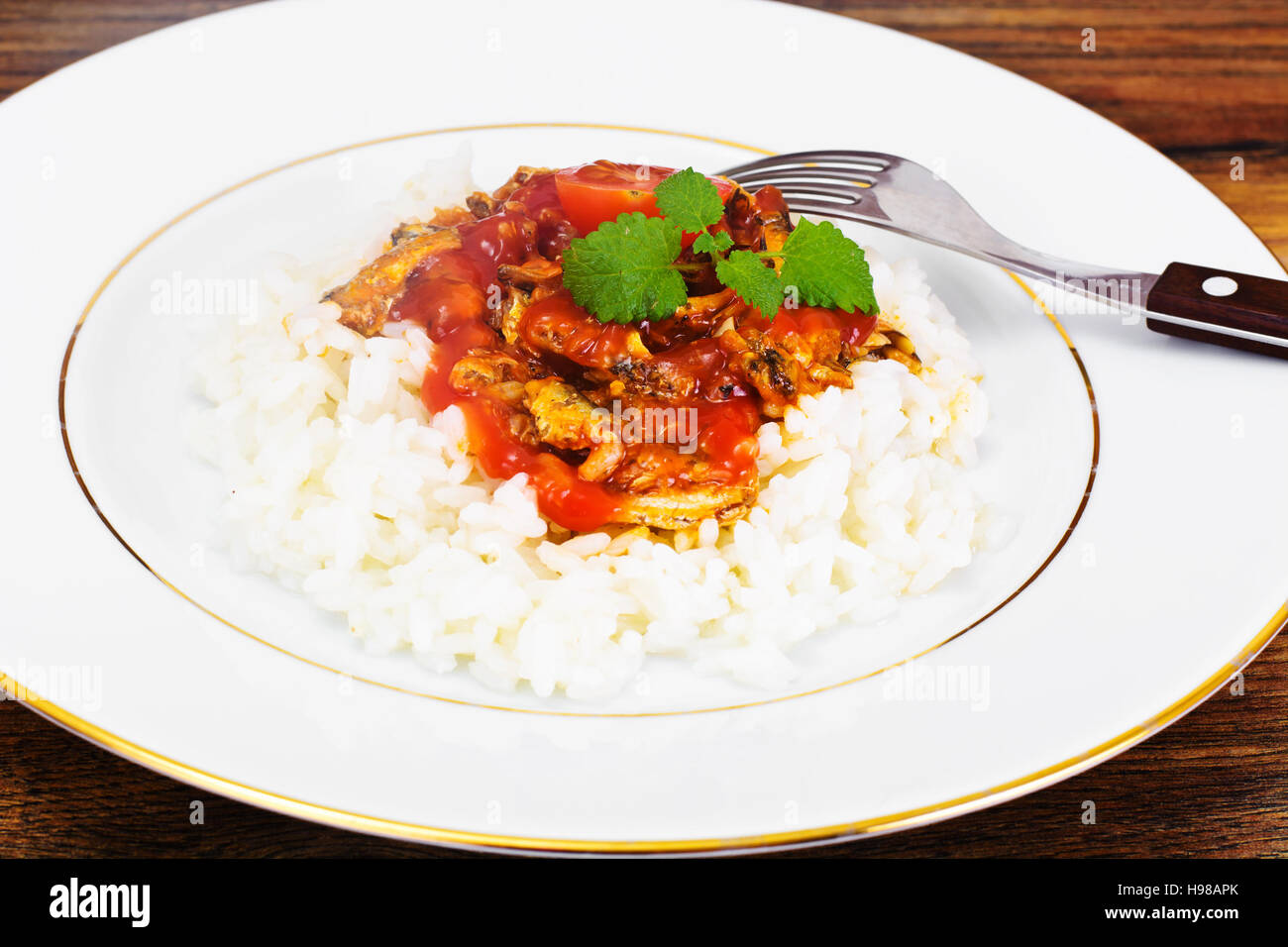 Rice with Canned Fish in Tomato Sauce Studio Photo Stock Photo - Alamy