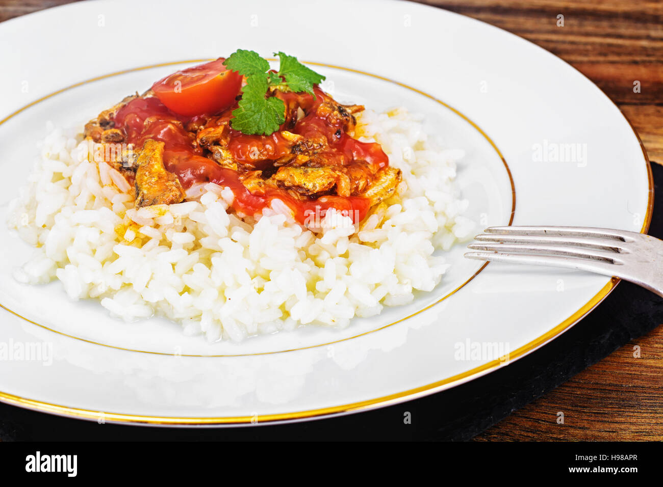 Rice with Canned Fish in Tomato Sauce Studio Photo Stock Photo - Alamy