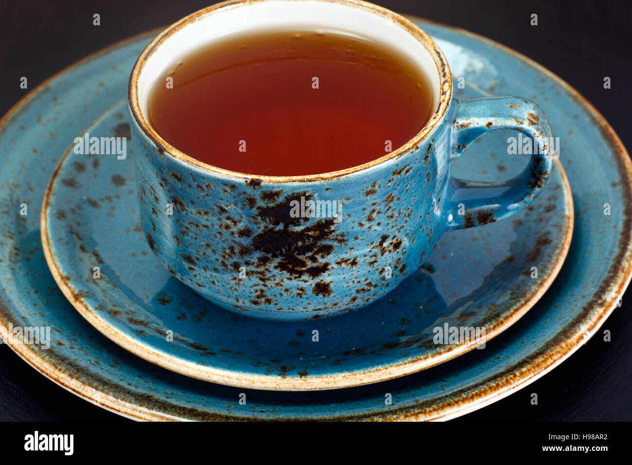 Red Tea in Beautiful Cup. Studio Photo Stock Photo - Alamy