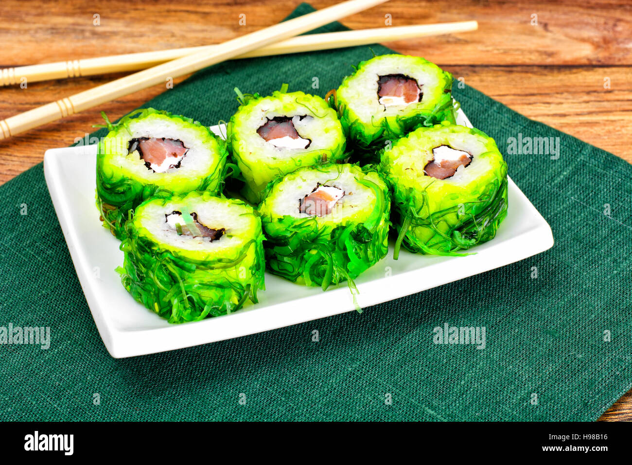 Sushi Roll with Chukoy, Salmon and Cheese. Studio Photo Stock Photo - Alamy