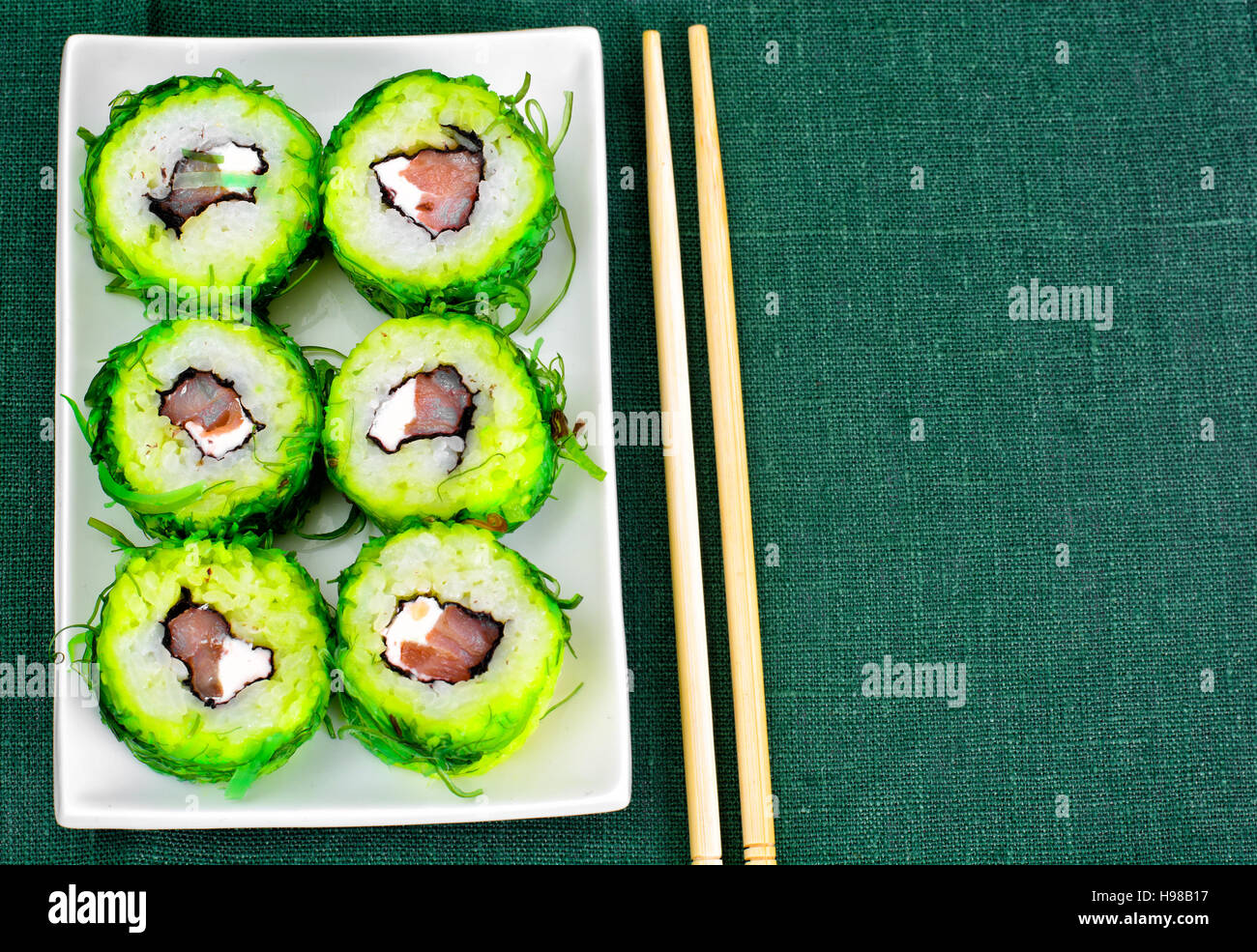 Sushi Roll with Chukoy, Salmon and Cheese. Studio Photo Stock Photo - Alamy