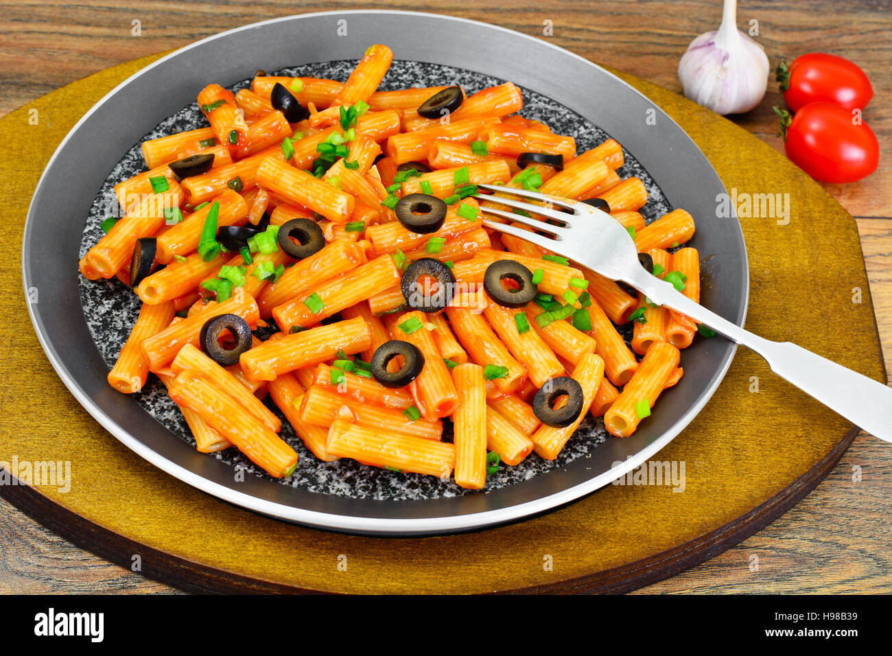 Pasta with Tomato Ketchup Sauce, Green Onions and Cheese Studio Photo ...