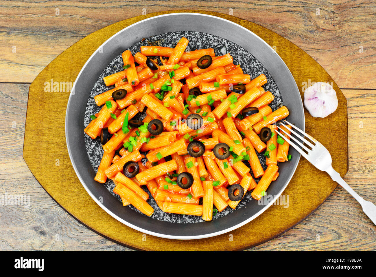 Pasta with Tomato Ketchup Sauce, Green Onions and Cheese Studio Photo ...
