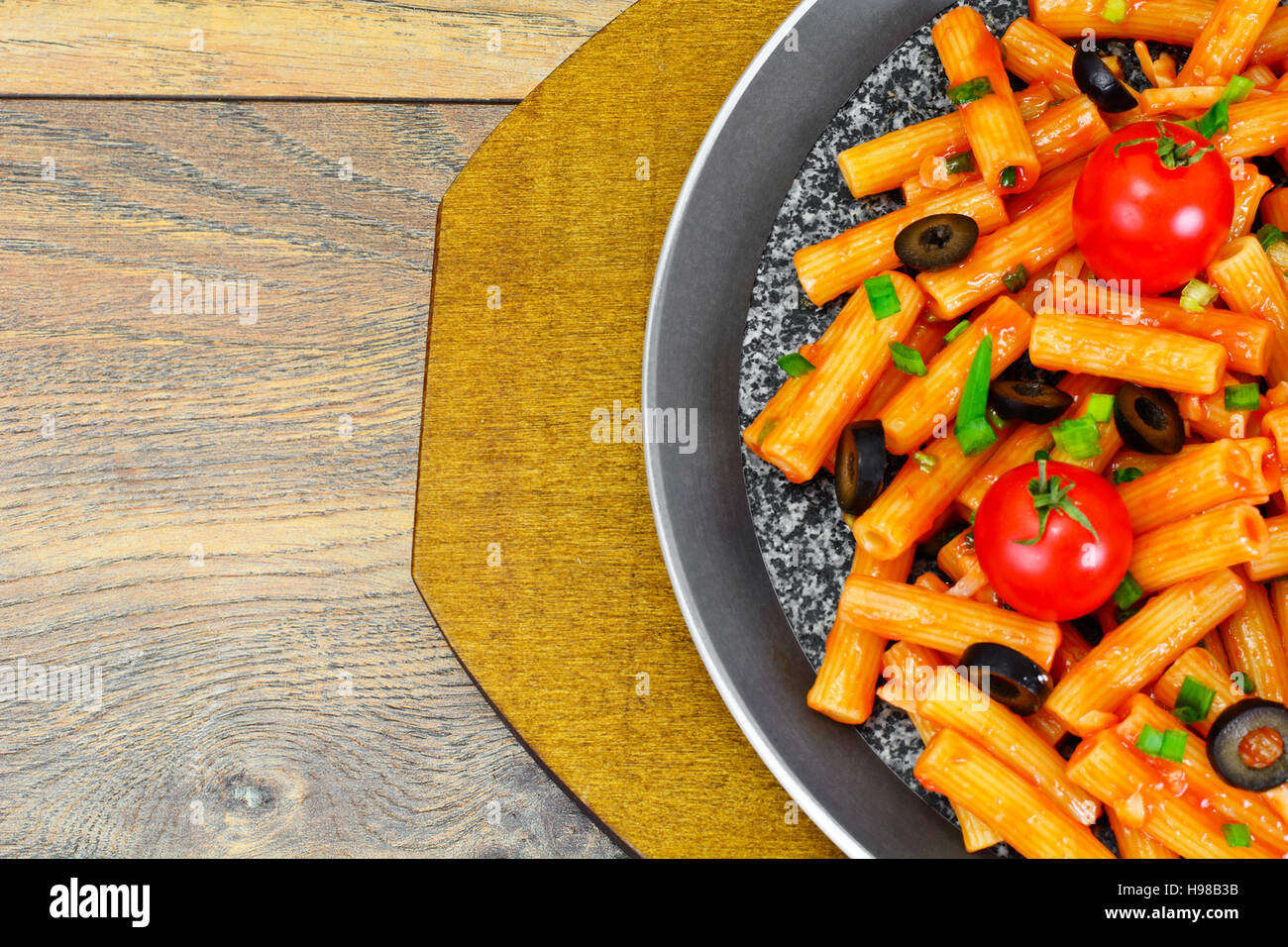 Pasta with Tomato Ketchup Sauce, Green Onions and Cheese Studio Photo ...