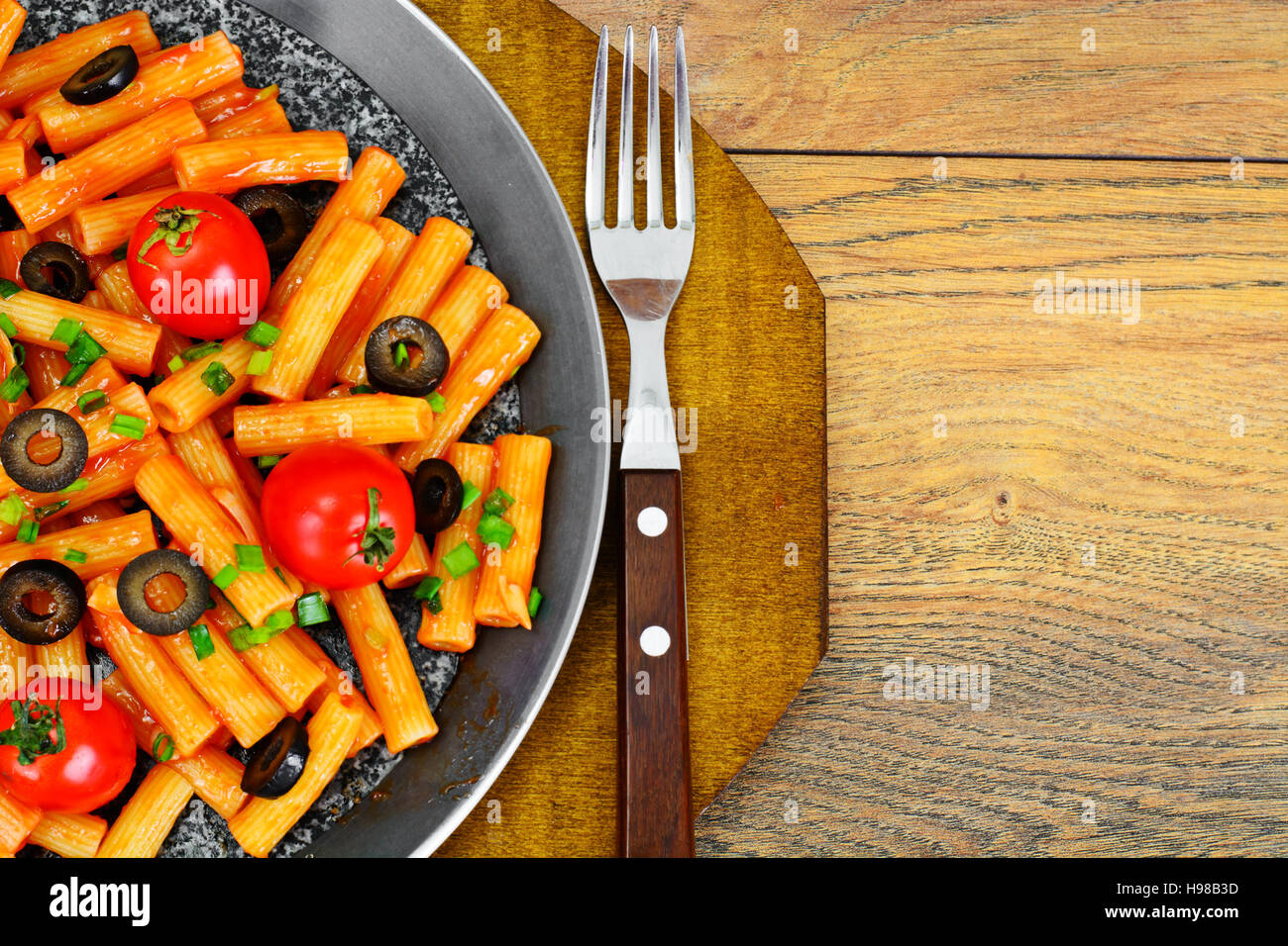 Pasta with Tomato Ketchup Sauce, Green Onions and Cheese Studio Photo ...