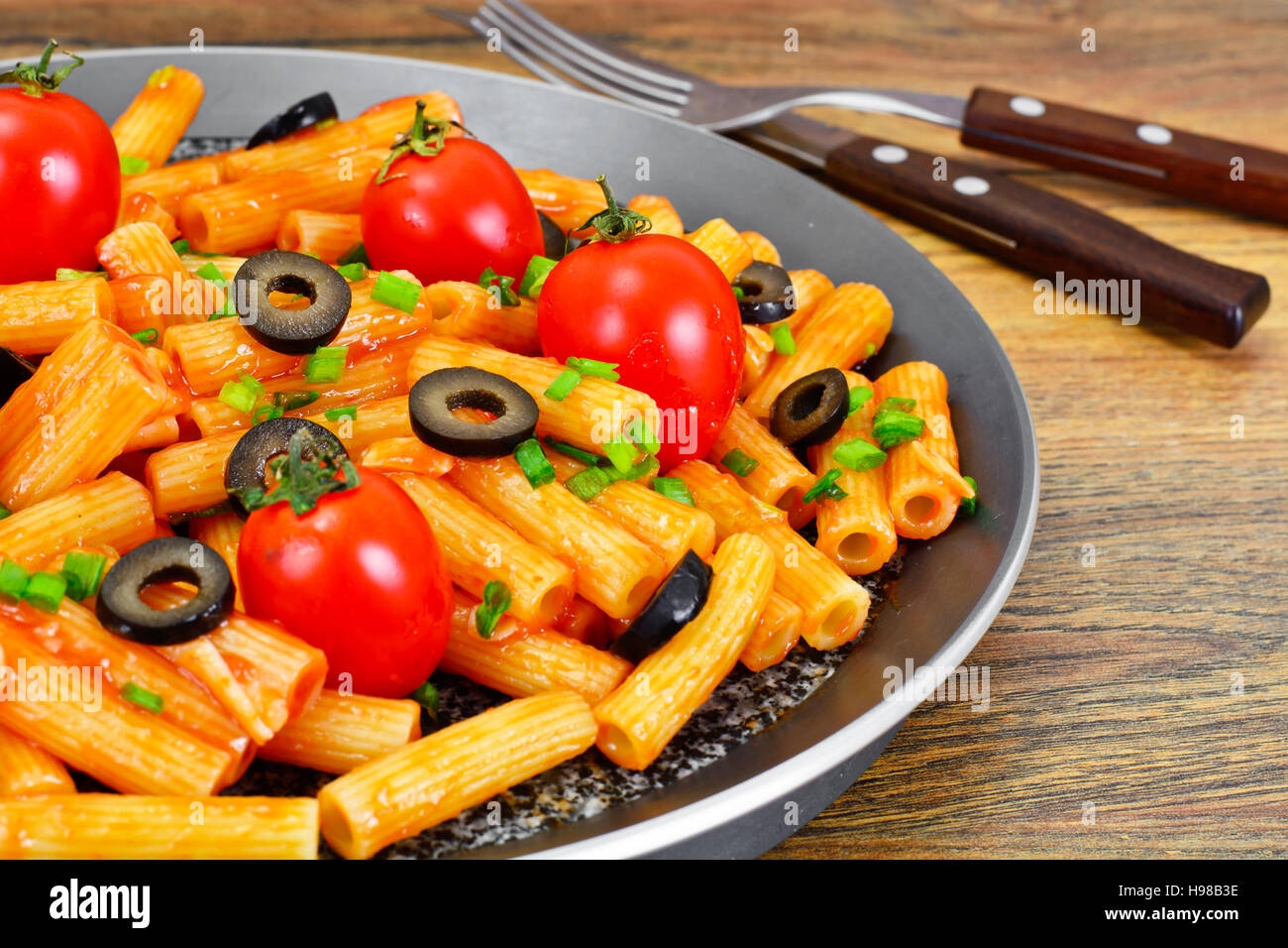 Pasta with Tomato Ketchup Sauce, Green Onions and Cheese Studio Photo ...