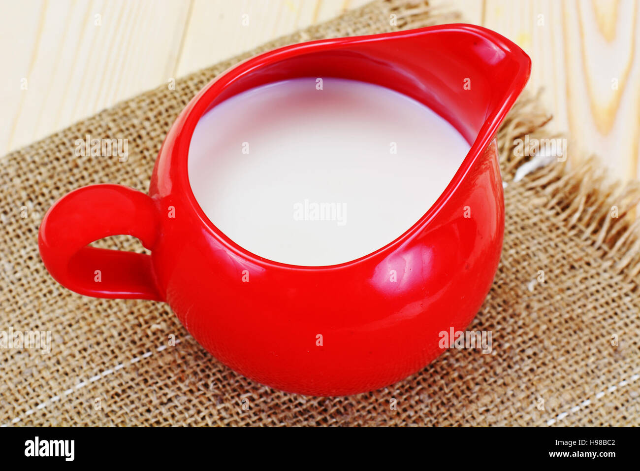 Milk in a Red Earthen Pot Studio Photo Stock Photo - Alamy